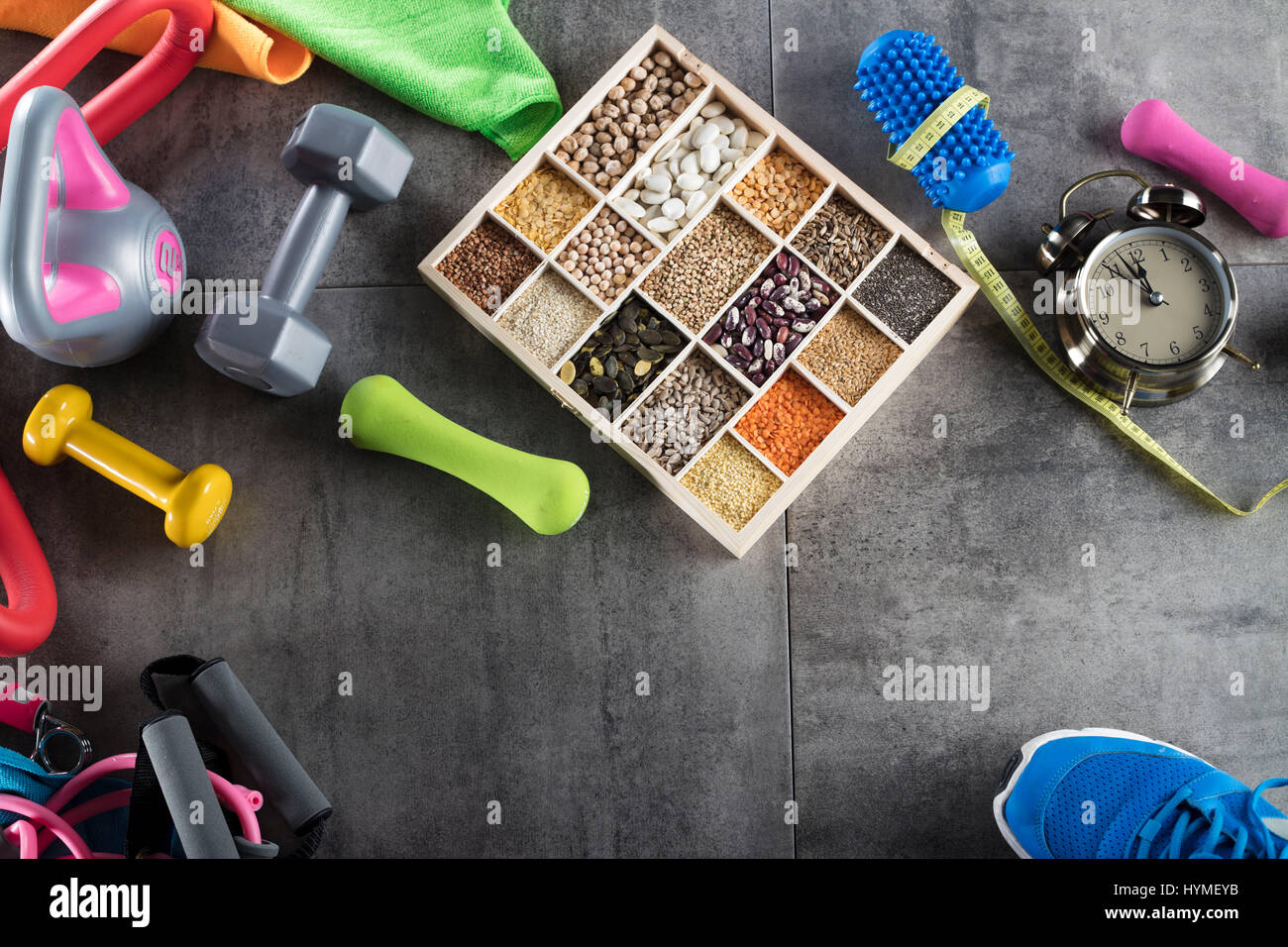 Fitness concept - objects and nutrition on stone floor Stock Photo - Alamy
