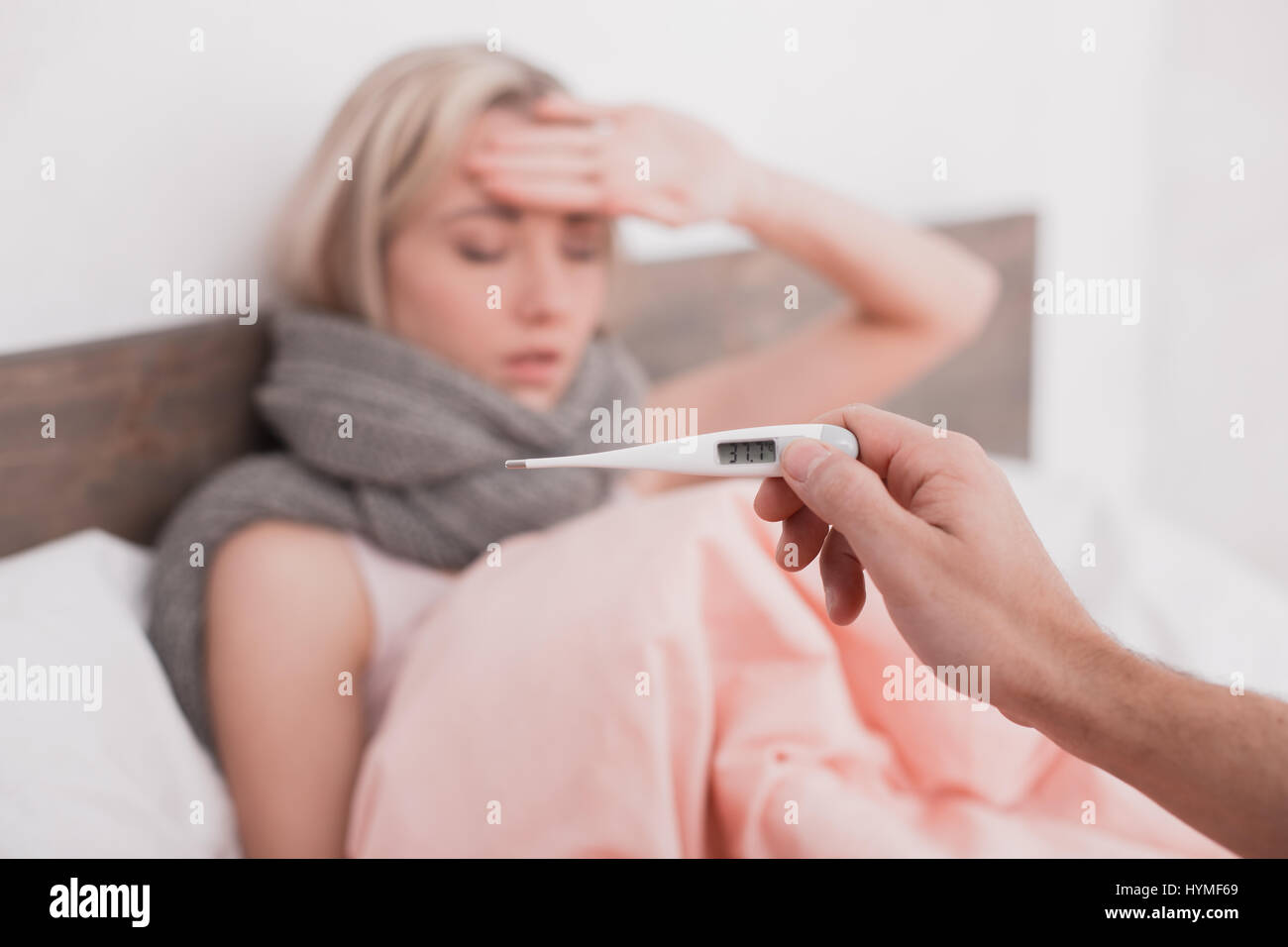 Sick young woman fever concept Stock Photo - Alamy
