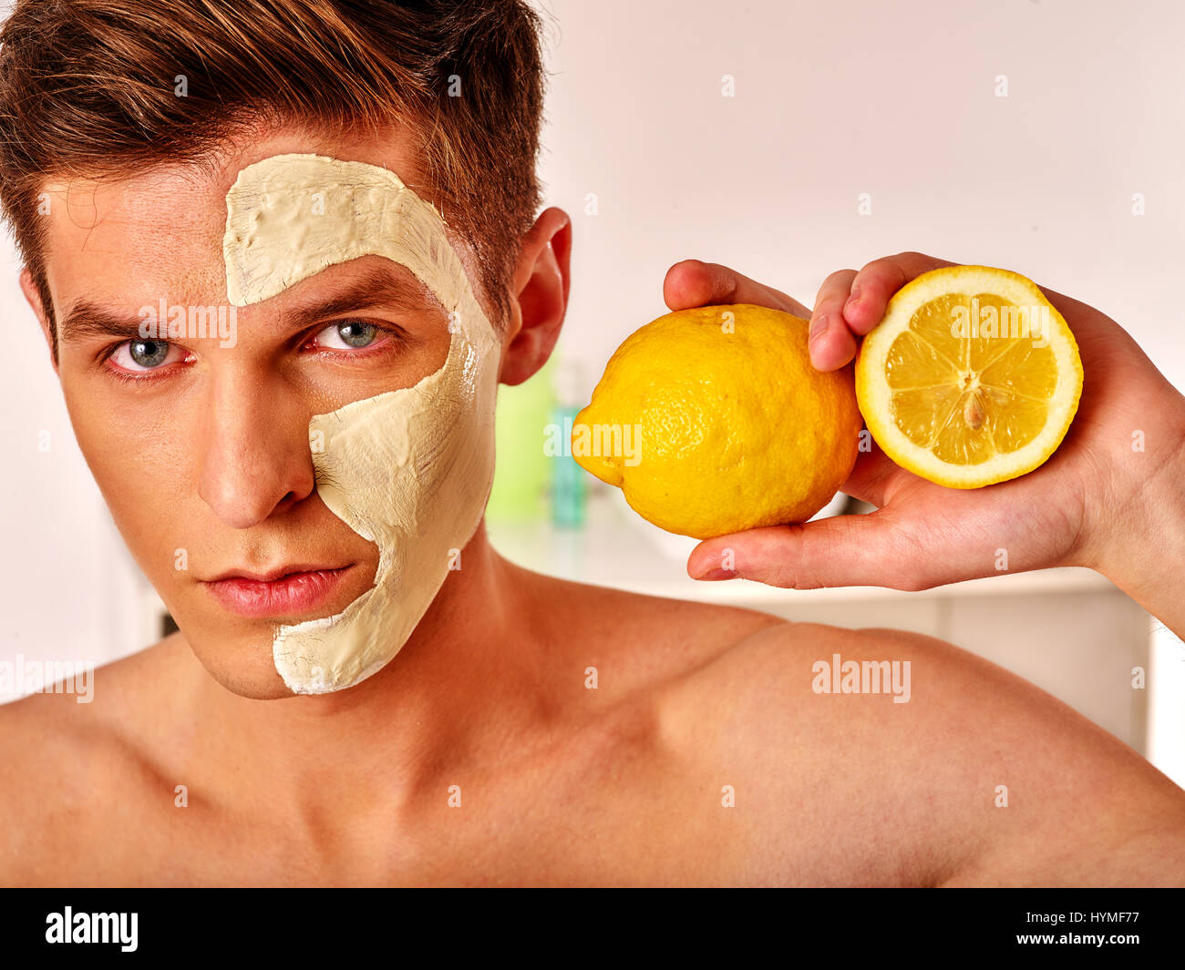 Facial man mask from fruits and clay . Face mud applied Stock Photo - Alamy