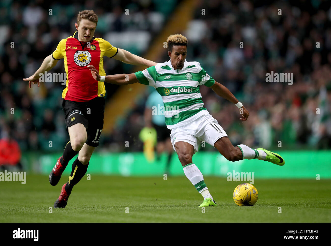 Celtic's Scott Sinclair (right) and Partick Thistle's Niall Keown battle for the ball during the ...
