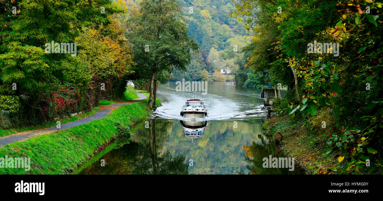 boat sailing on a navigable channel Stock Photo - Alamy