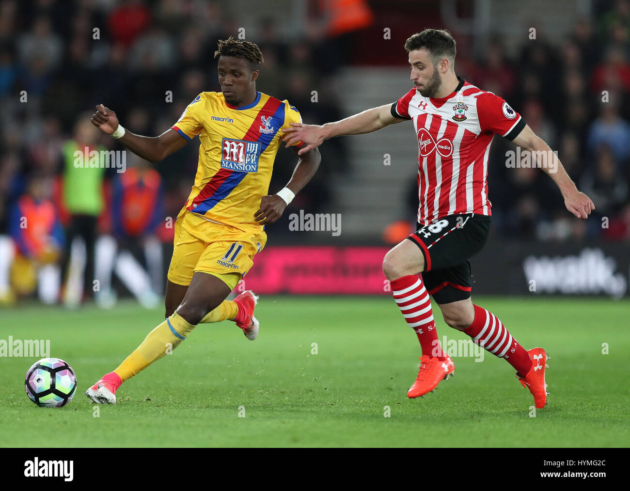 Crystal Palace's Wilfried Zaha (left) and Southampton's Steven Davis ...