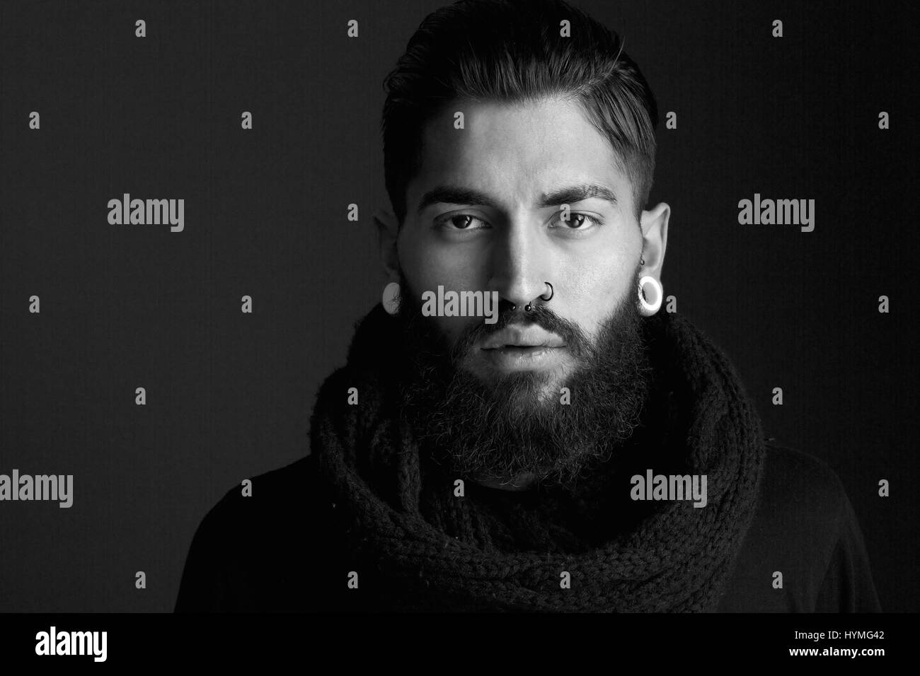 Black and white close up portrait male fashion model with beard and ...