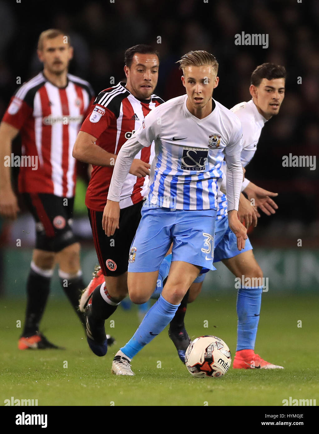 Coventry City's Ben Stevenson (right) and Sheffield United's Samir ...