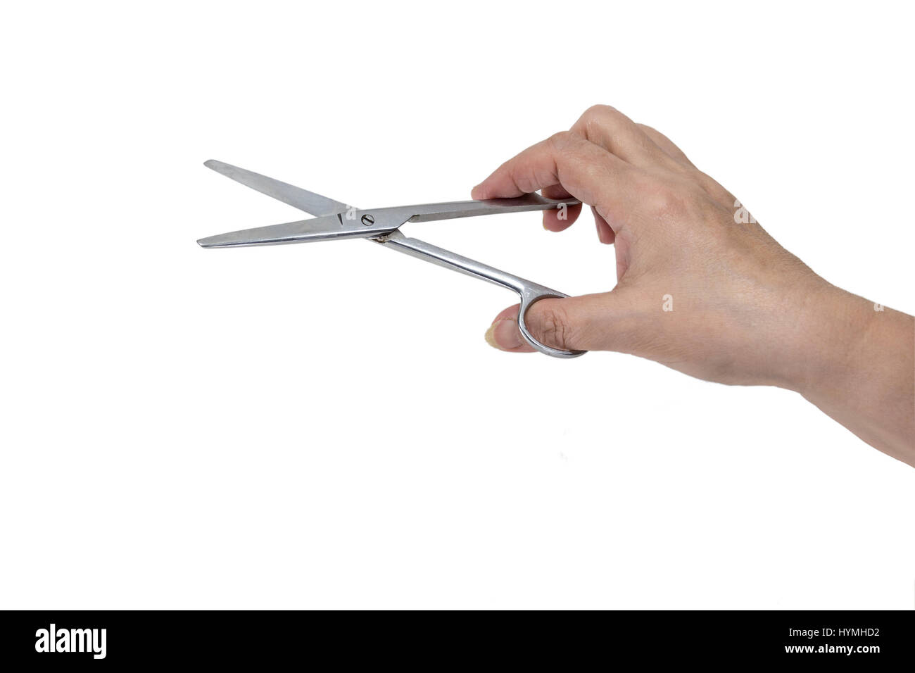 Senior woman's hand keeps scissors isolated on white background Stock ...