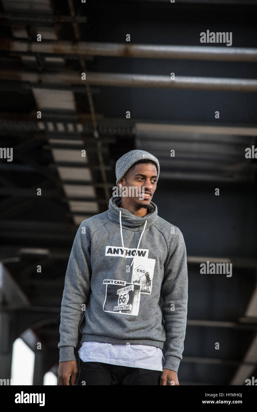 Young black hipster poses candid hi-res stock photography and images ...
