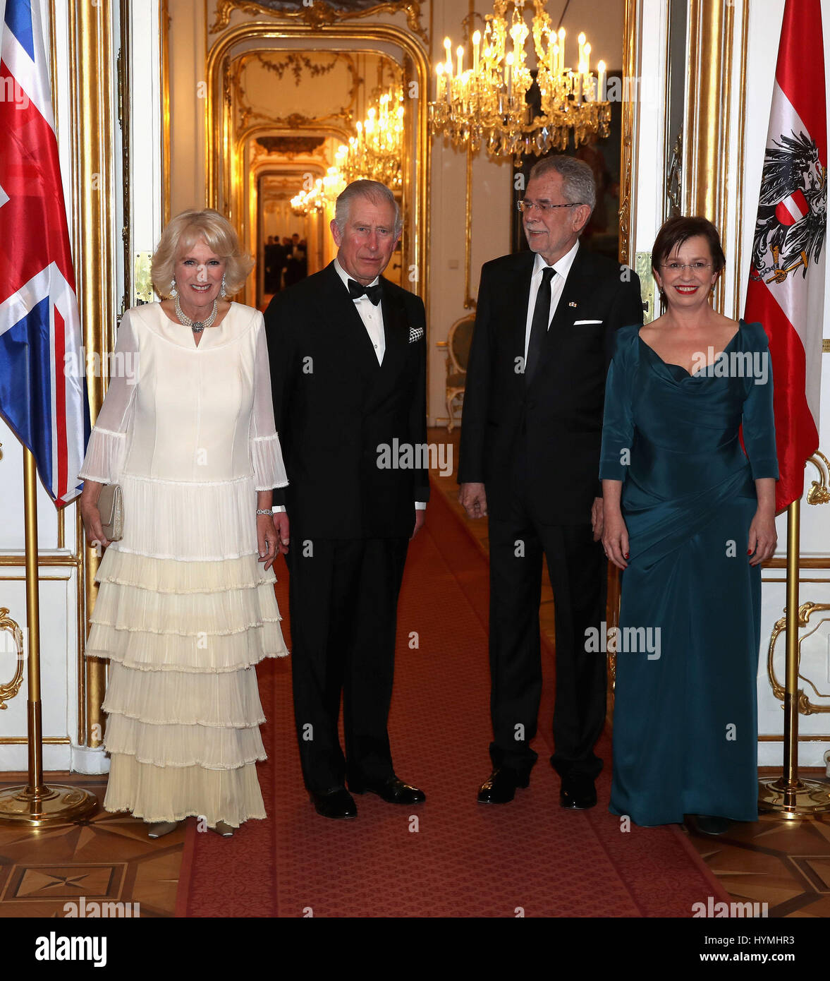 The Prince of Wales and the Duchess of Cornwall (left) are greeted by ...