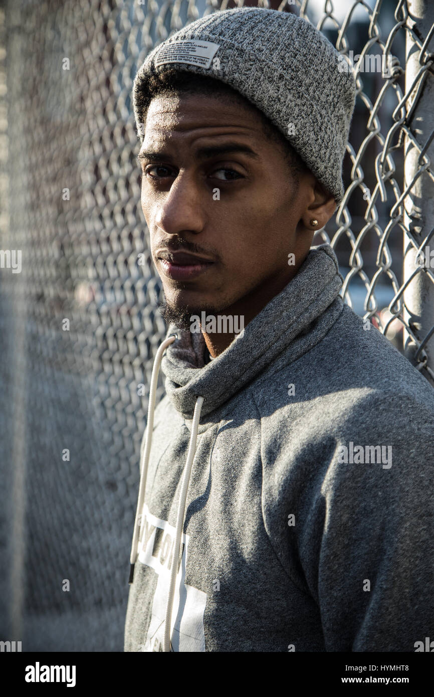 Young black hipster poses candid hi-res stock photography and images ...