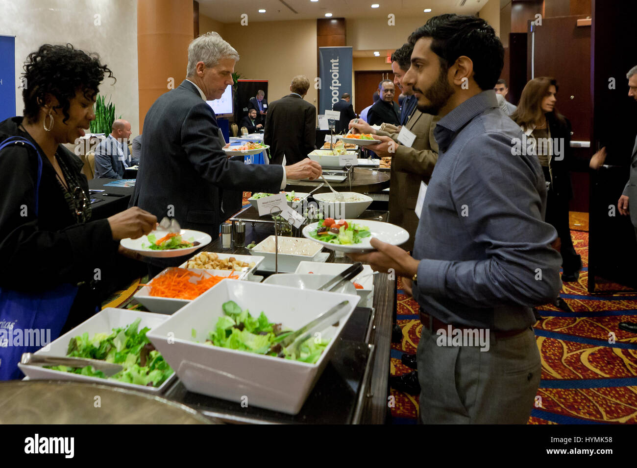 Man getting lunch at salad bar - USA Stock Photo - Alamy
