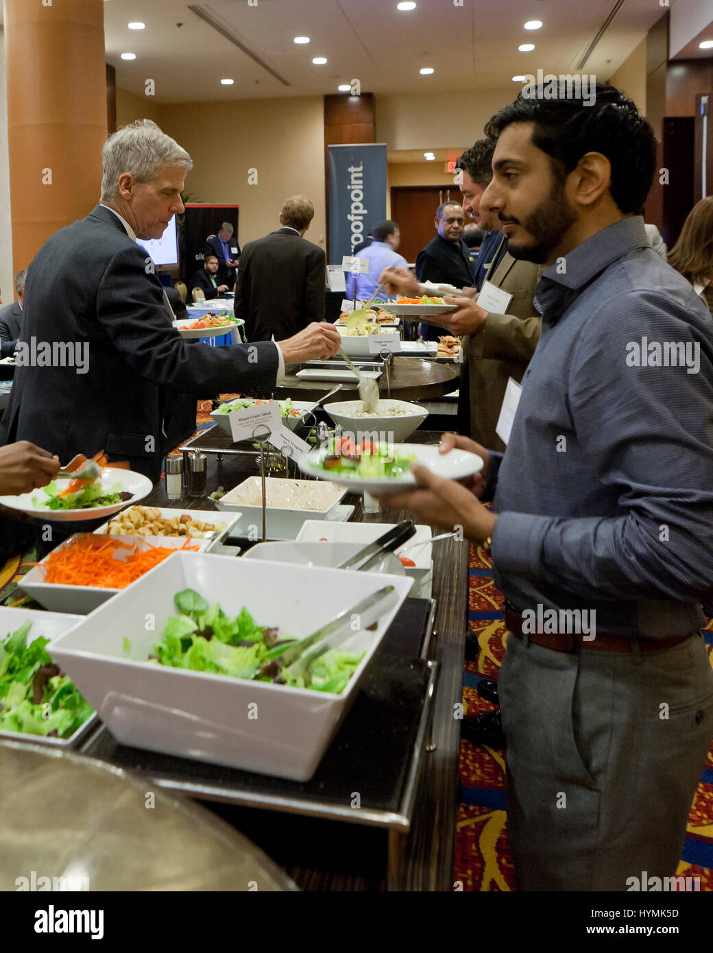 Man getting lunch at salad bar - USA Stock Photo - Alamy