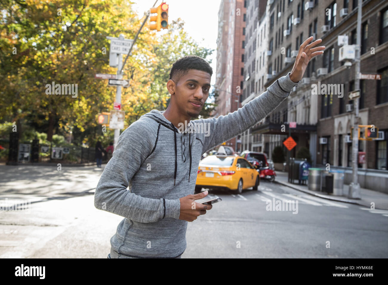 Young black hipster poses candid hi-res stock photography and images ...
