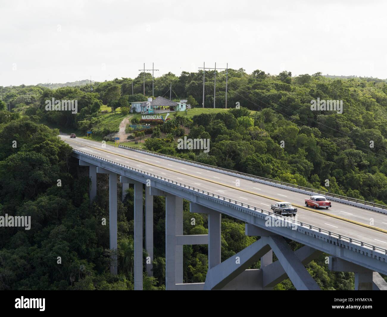 Classic 1950's American Cars crossing the highest bridge in Cuba, The ...