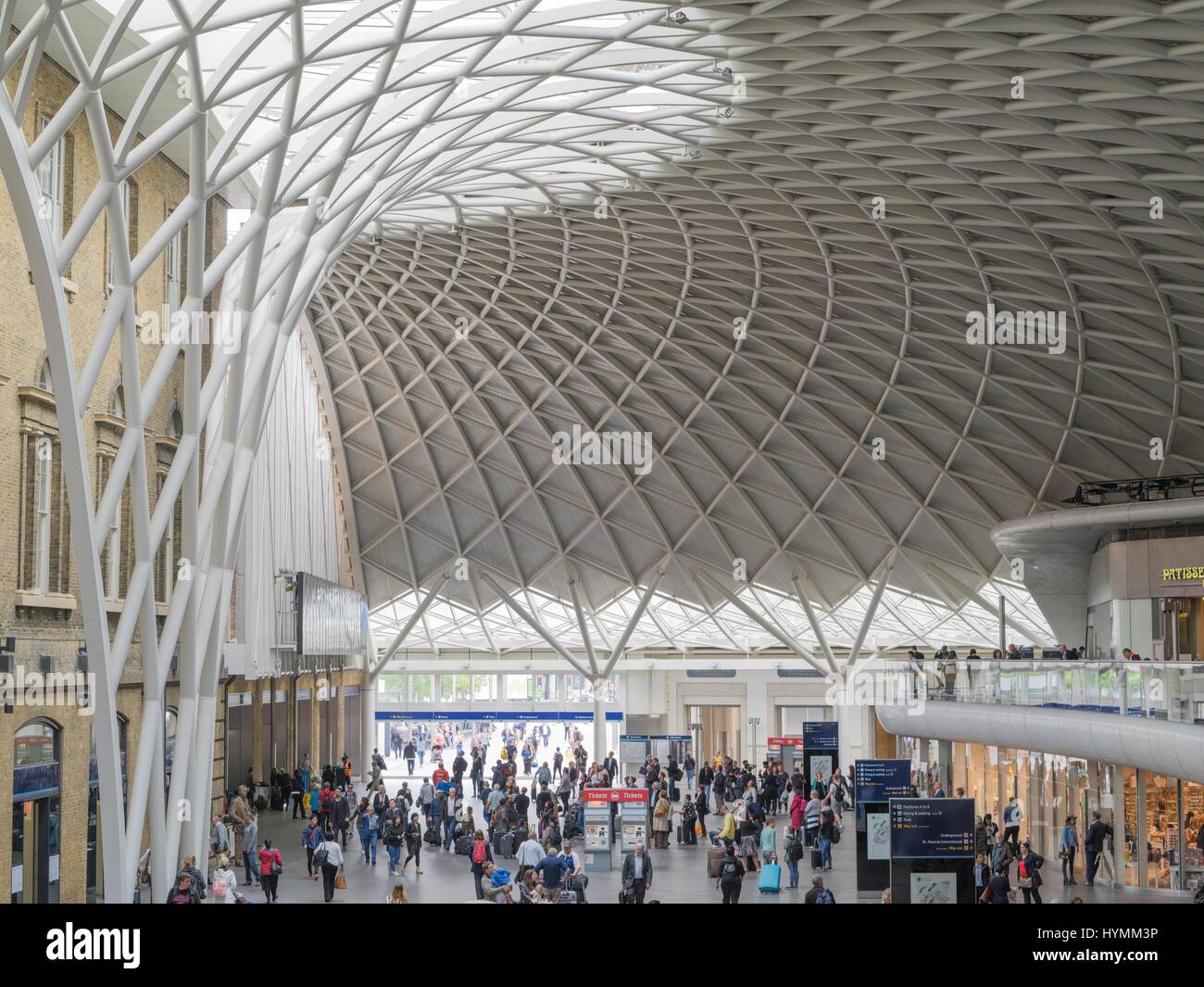 Travellers And Commuters In Kings Cross Railway Station London