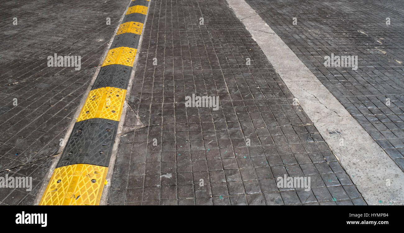 Speed bump on road hi-res stock photography and images - Alamy