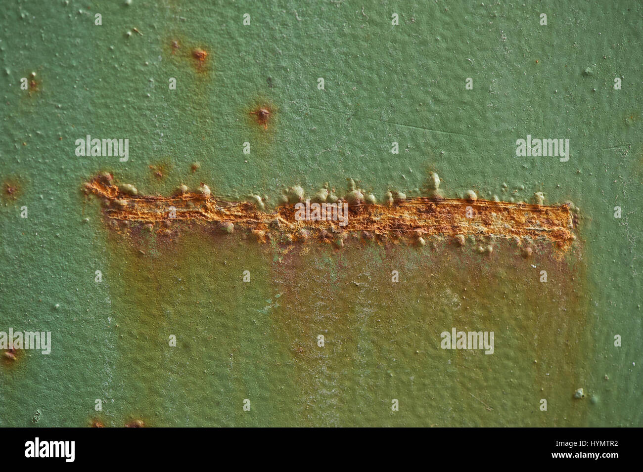 Close up of a green metal surface with rust texture Stock Photo - Alamy