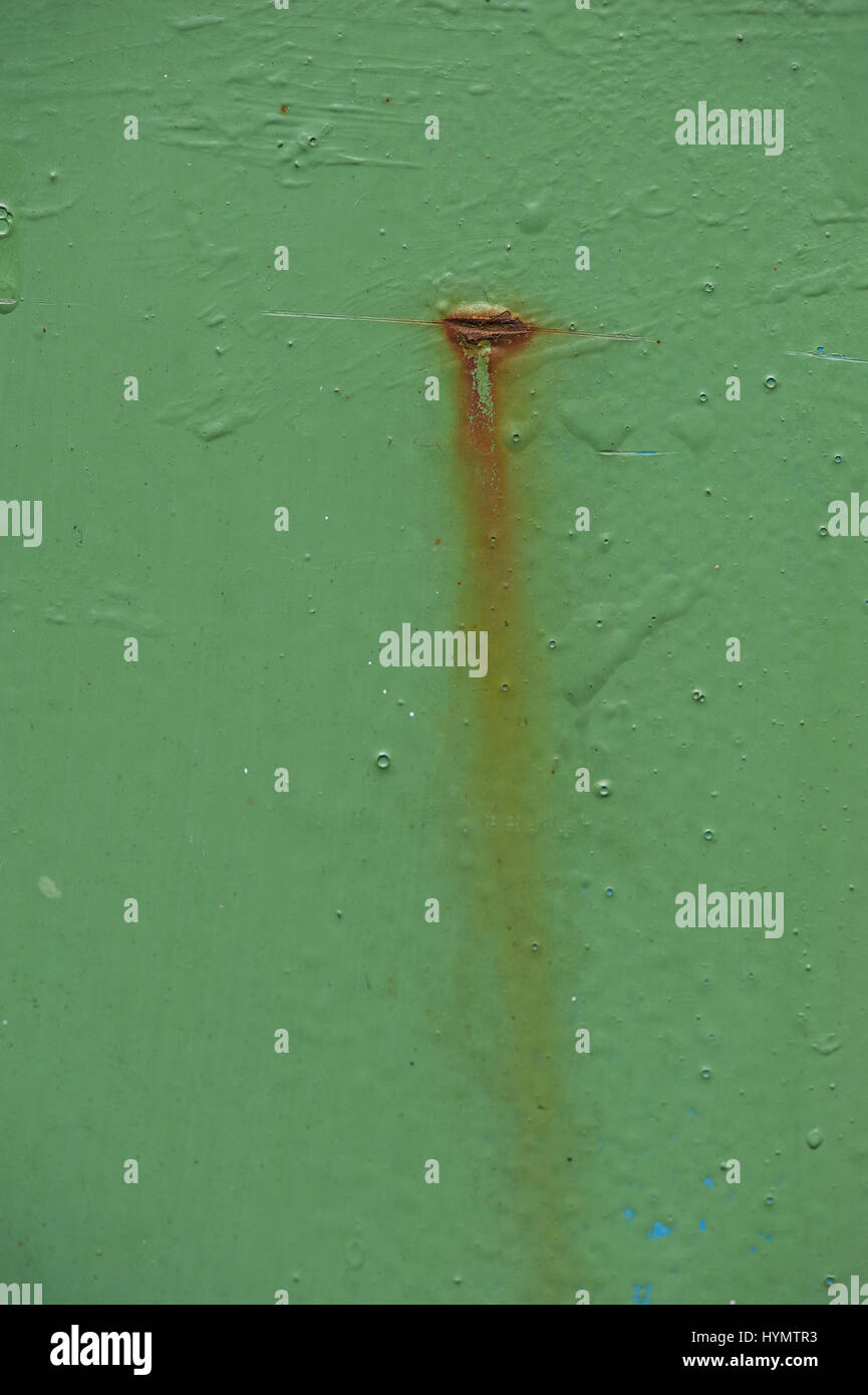 Close up of a green metal surface with rust line Stock Photo - Alamy