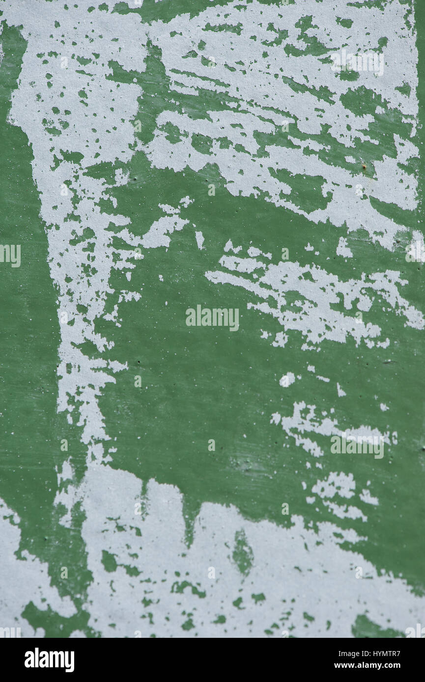 Green wall with white paint scraped texture Stock Photo - Alamy