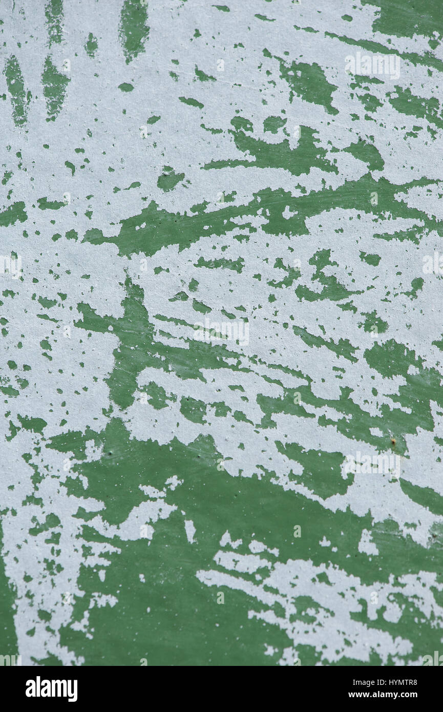 Green wall with white paint scraped wallpaper texture Stock Photo - Alamy