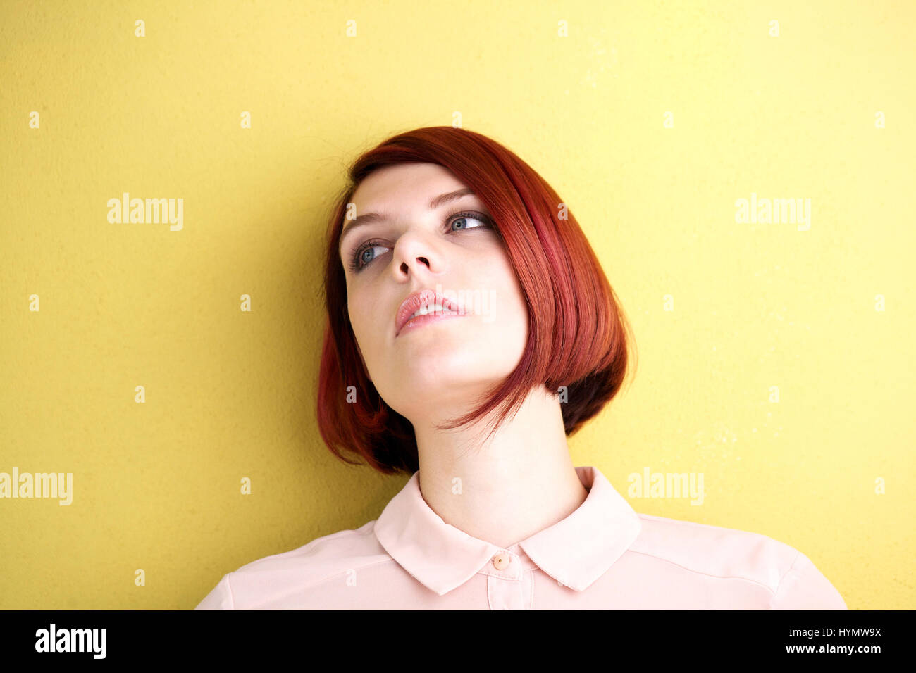 Horizontal close up portrait of a beautiful young woman thinking Stock ...