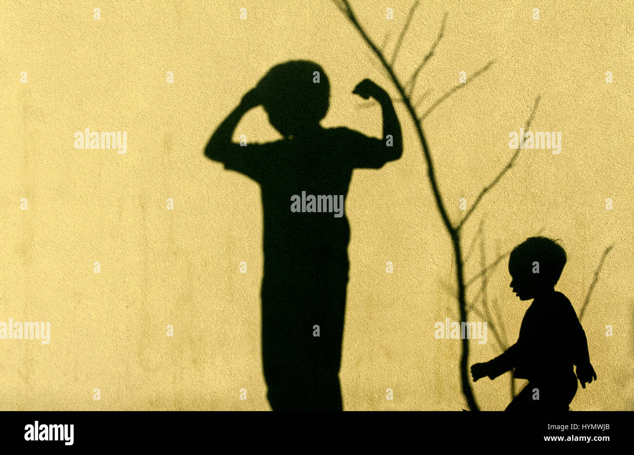 Shadows of children playing on the wall Stock Photo - Alamy