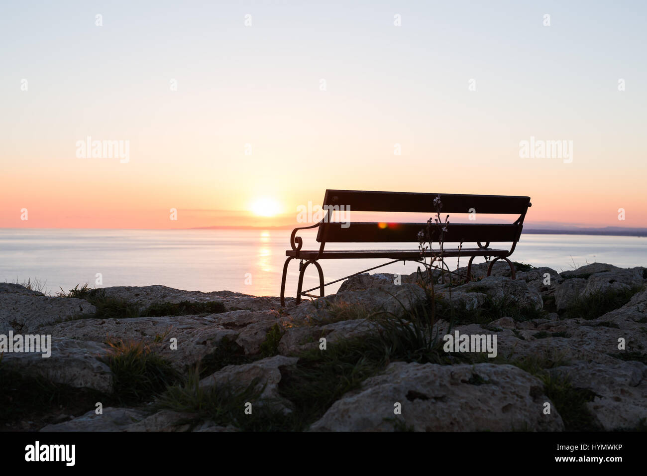 Back view of bench near sea. Sea shore bench Stock Photo - Alamy