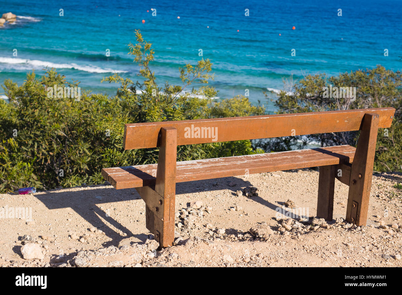 Back view of bench near sea. Sea shore bench Stock Photo - Alamy