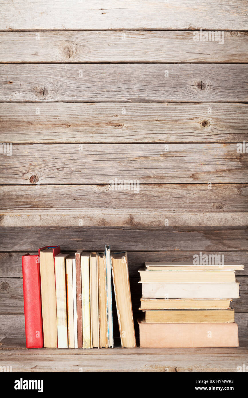 Old books on a wooden shelf. With empty space Stock Photo - Alamy
