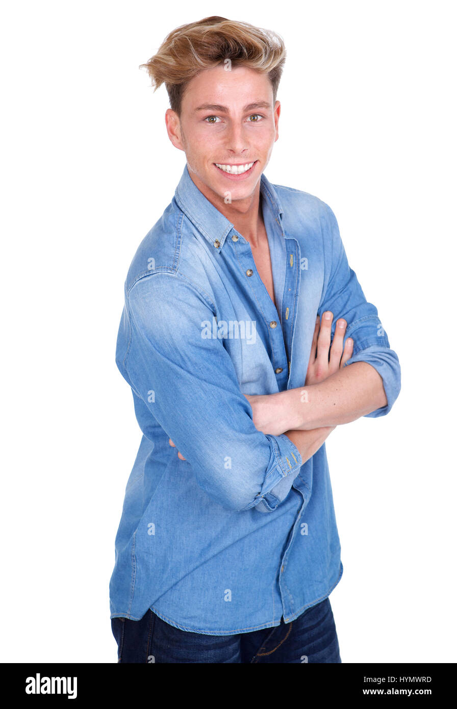 Portrait of a cute guy smiling with arms crossed on isolated white ...