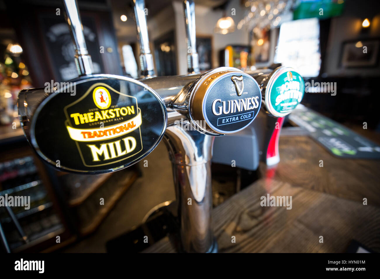 Drink taps in an English pub Stock Photo - Alamy