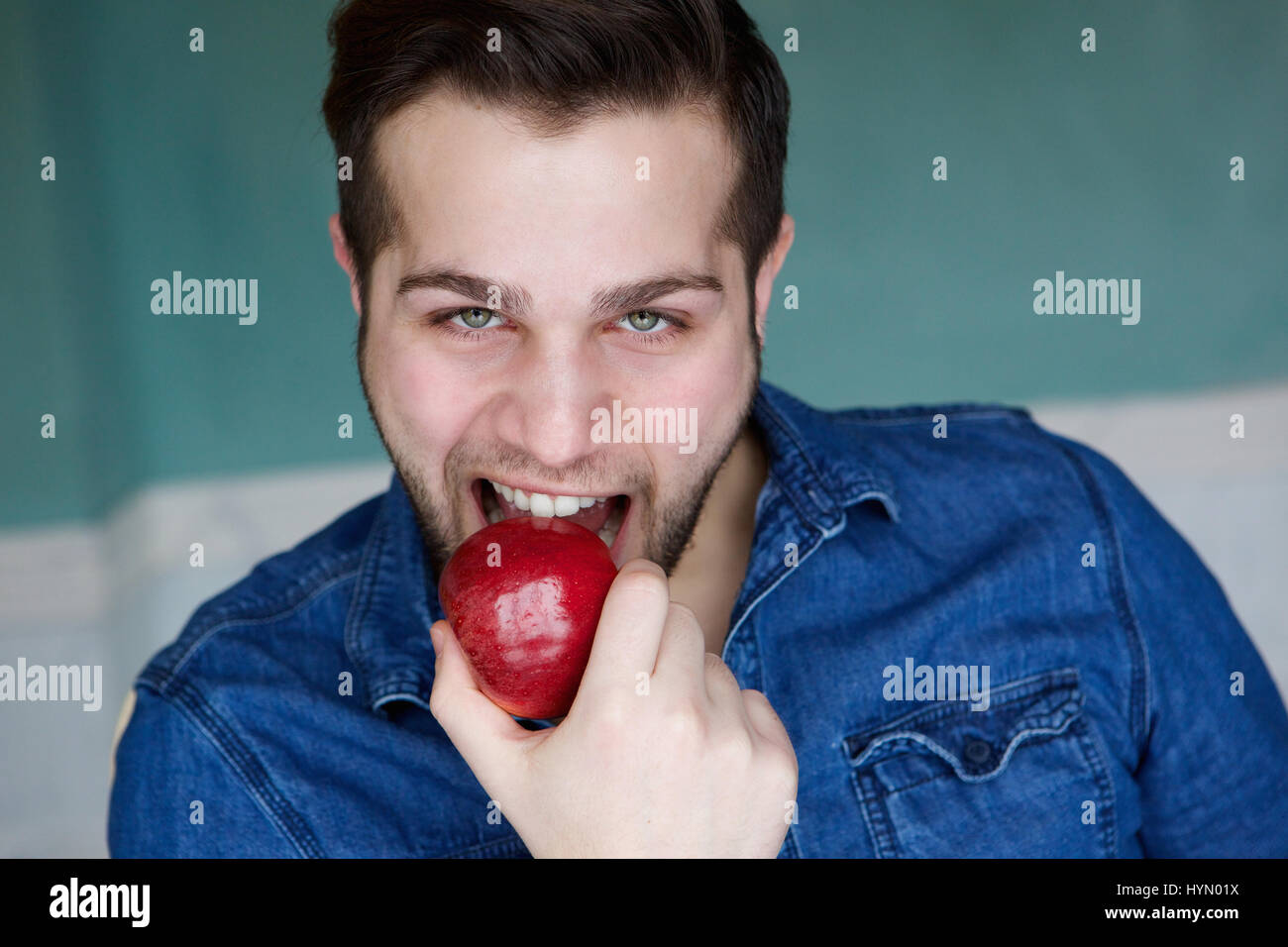 Closeup man eating apple hi-res stock photography and images - Alamy
