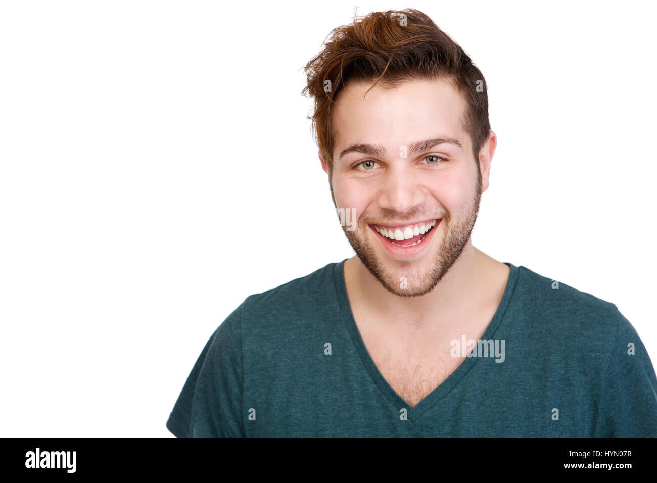Close up portrait of a handsome young man smiling on isolated white ...