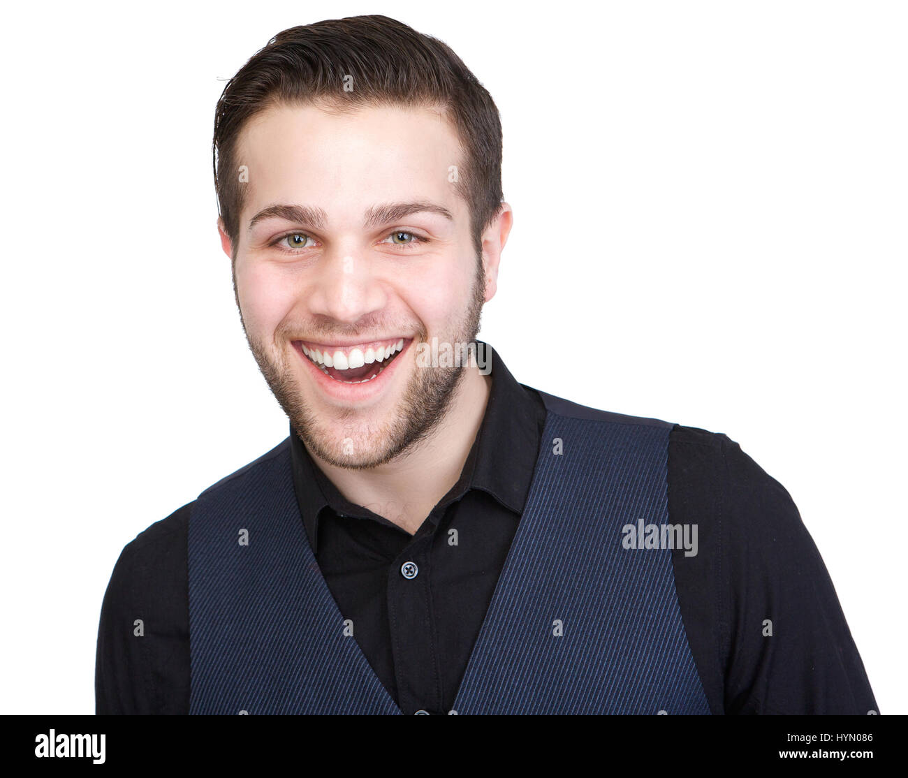 Close up portrait of a confident young man smiling on isolated white ...
