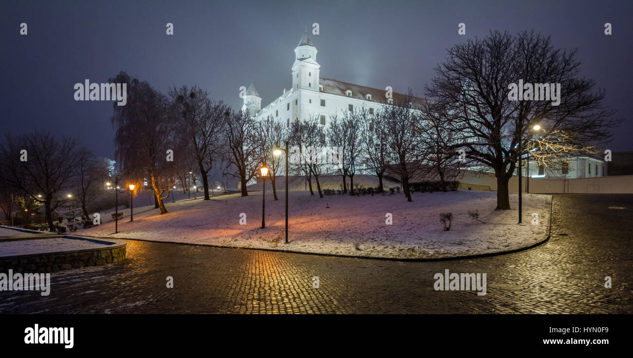 Bratislava Castle in a snowy winter night Stock Photo - Alamy
