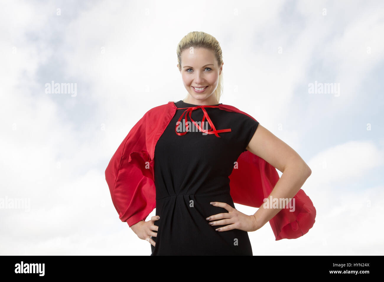 business woman wearing a cape because she is awesome Stock Photo - Alamy