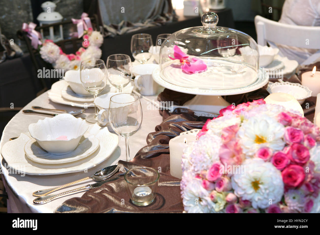 Table setting in beige and brown for elegant dinner Stock Photo - Alamy