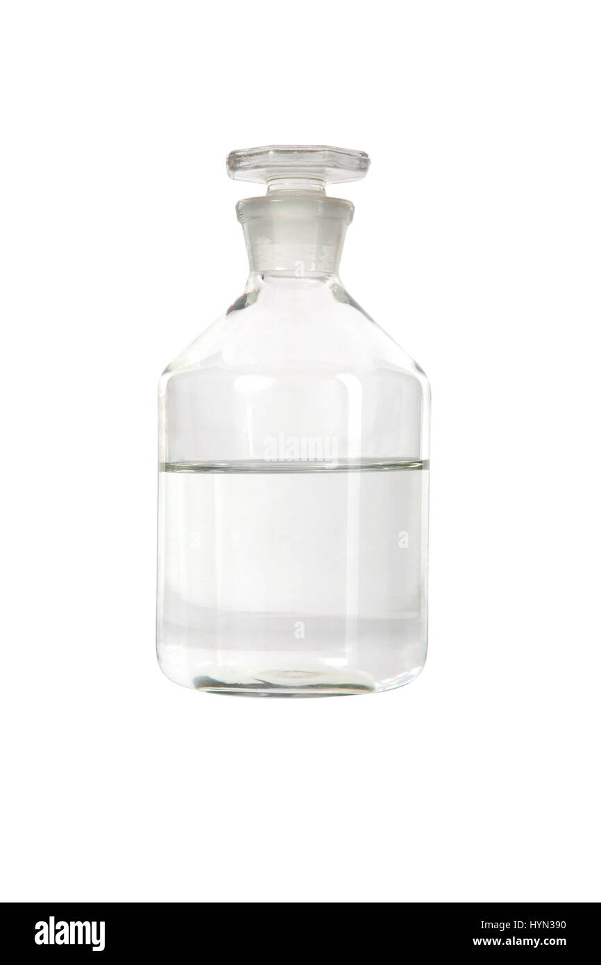Medical alcohol bottle with liquid inside-half full Stock Photo - Alamy