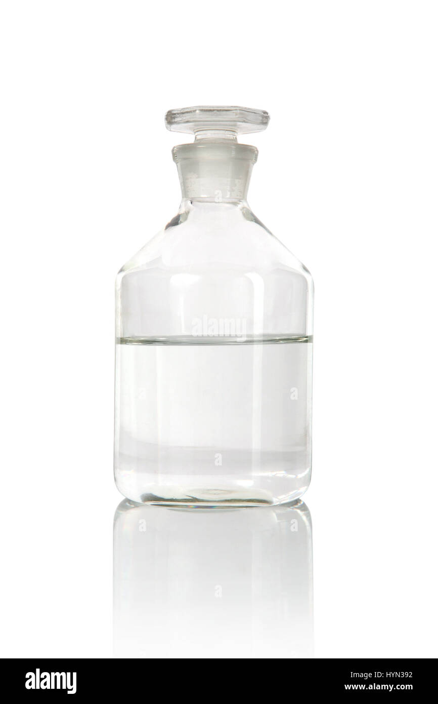 Medical alcohol bottle with liquid inside-half full Stock Photo - Alamy
