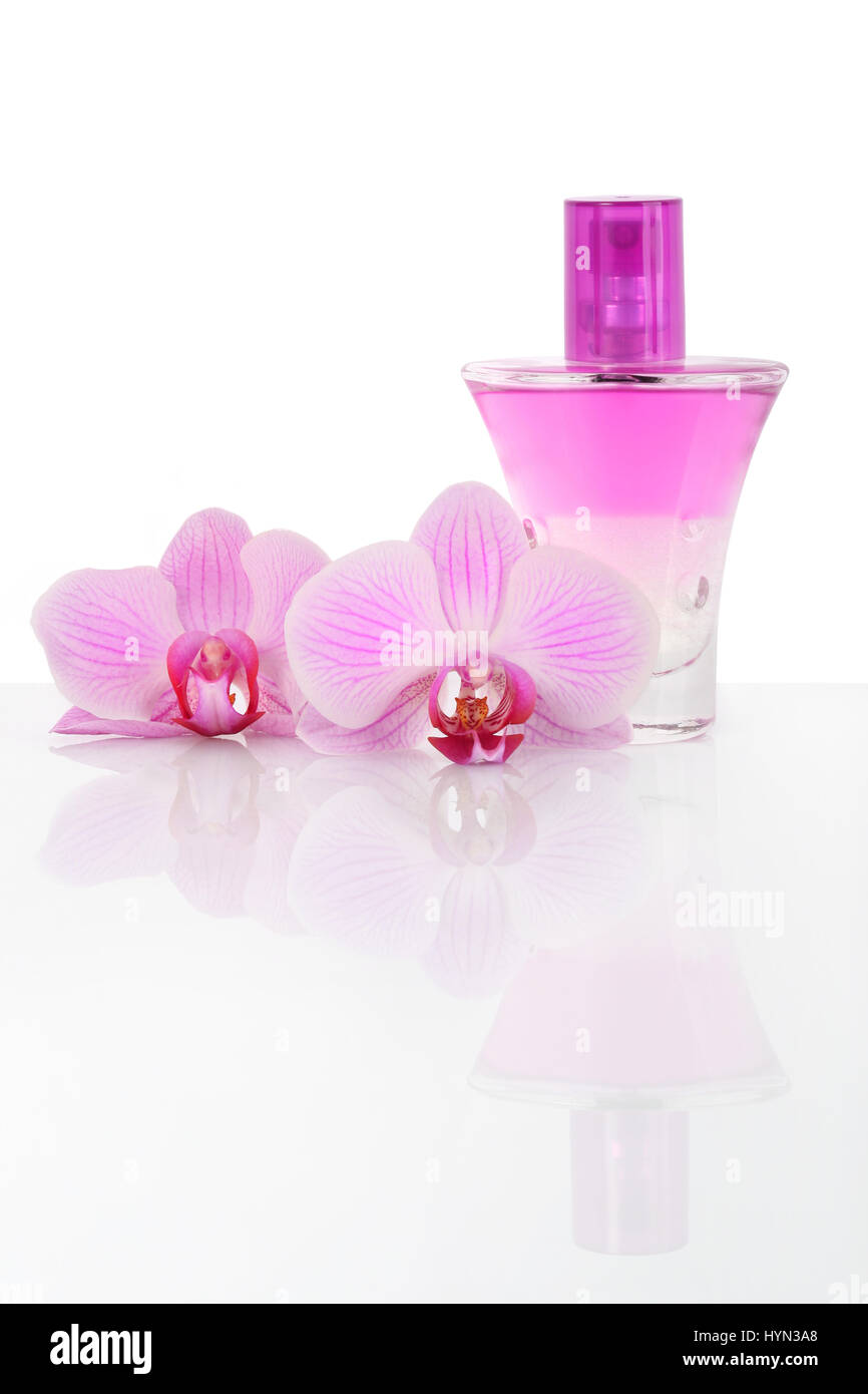 Oil base perfume and orchid flowers Stock Photo - Alamy