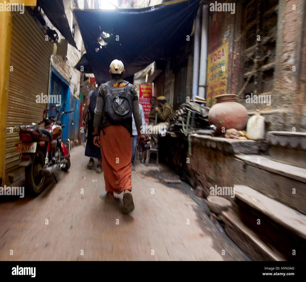 Indian people in alleyway in the holy city of Varanasi, Benares ...