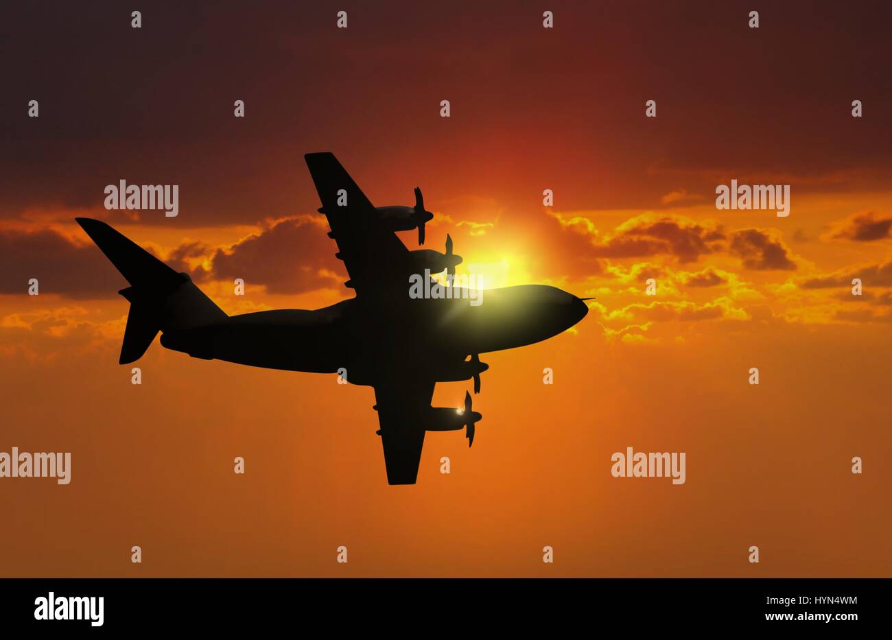 Airplane flying during sunset Stock Photo - Alamy