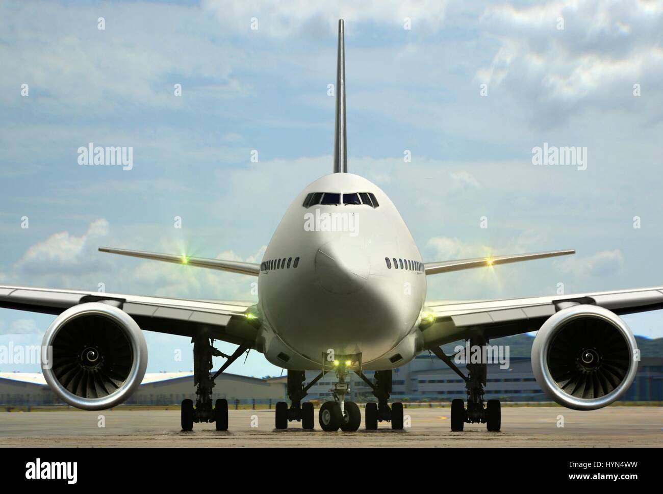 Airplane on airport runaway Stock Photo - Alamy