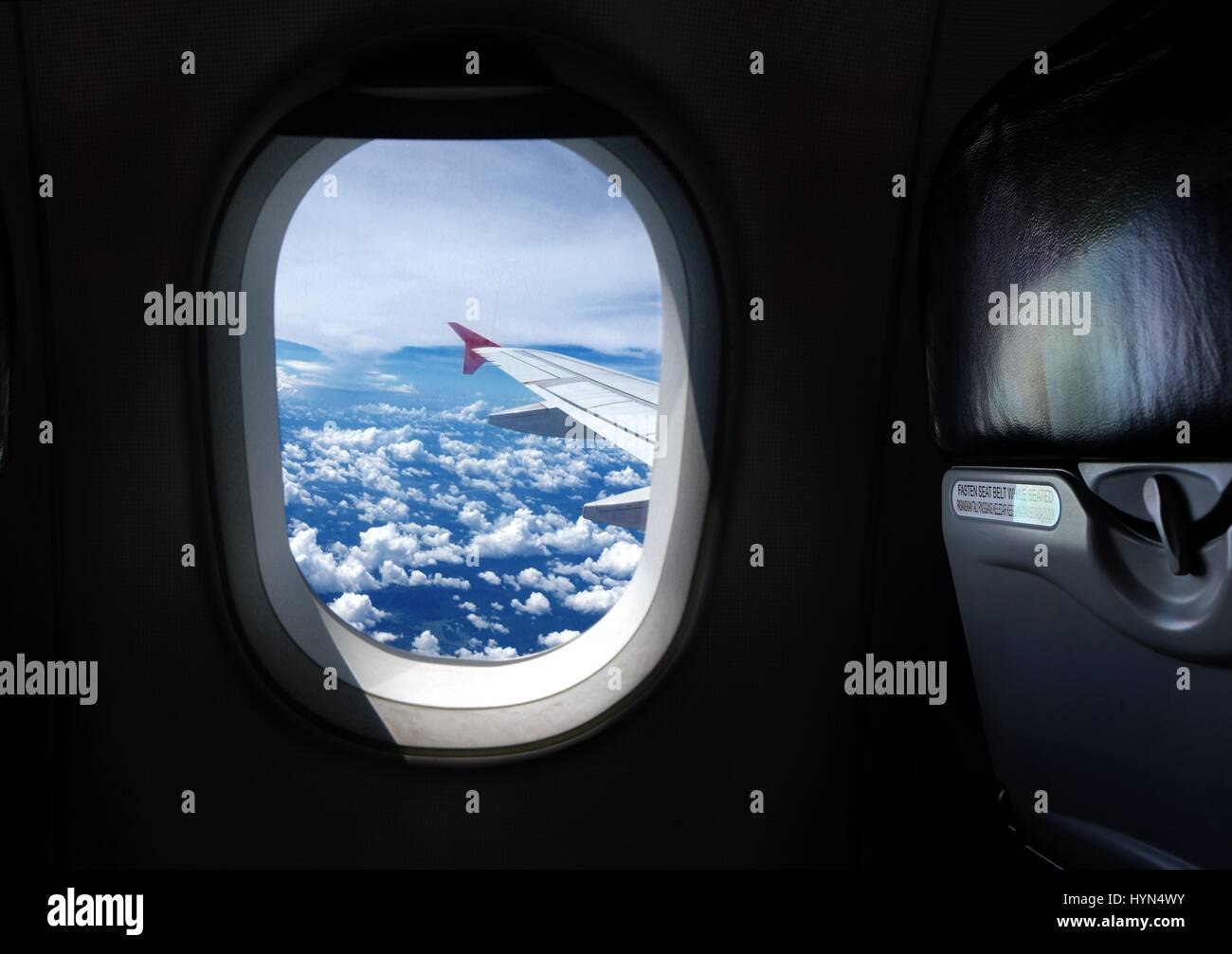 Airplane window seat with view Stock Photo - Alamy