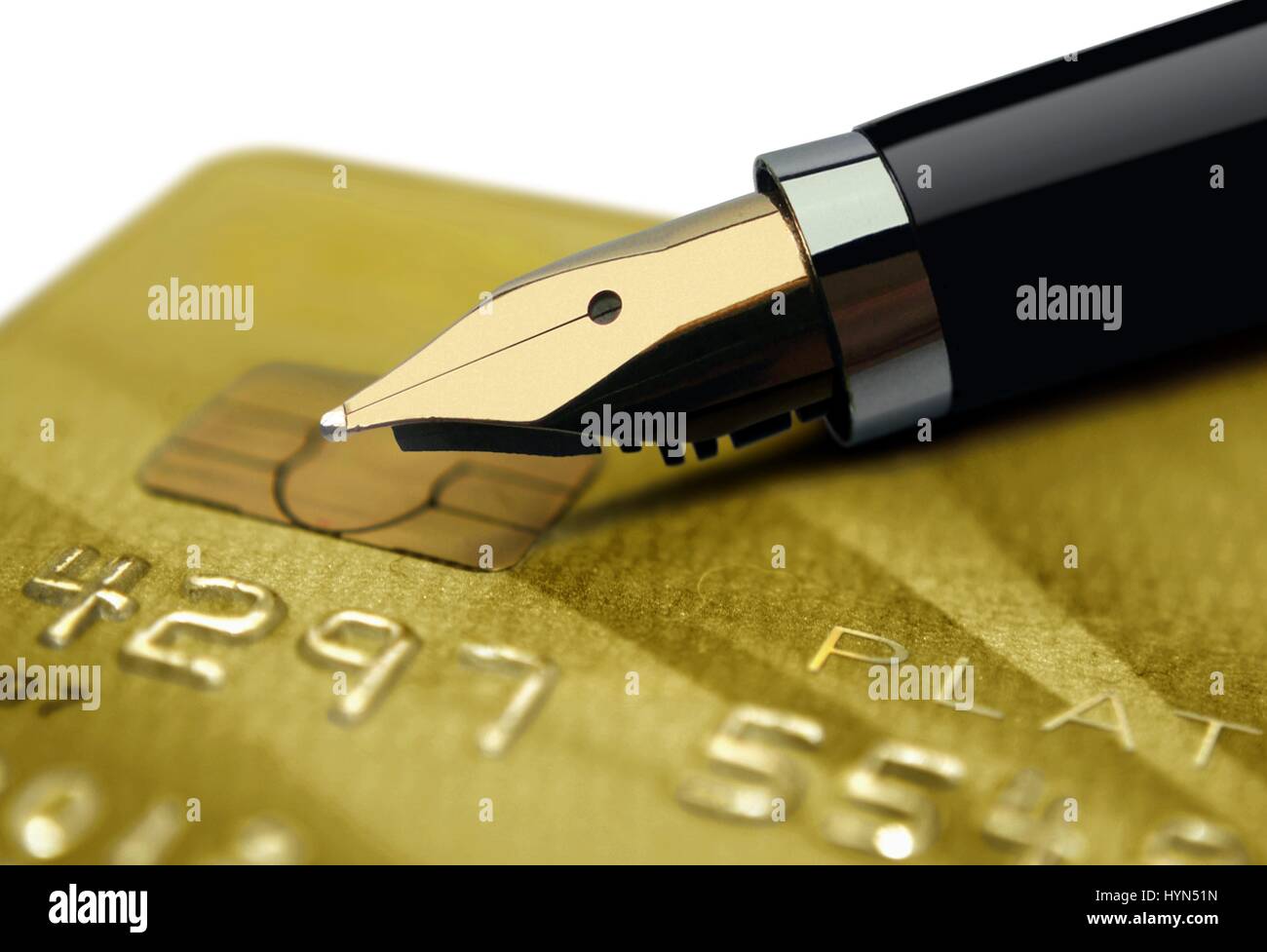 Credit card and ink pen Stock Photo - Alamy