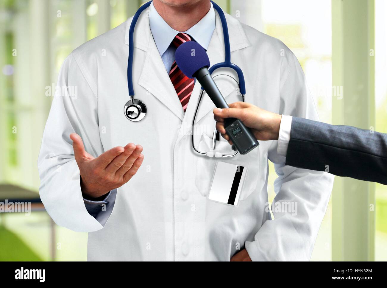 Doctor press interview Stock Photo - Alamy Doctor press interview Stock Photo - Alamy
