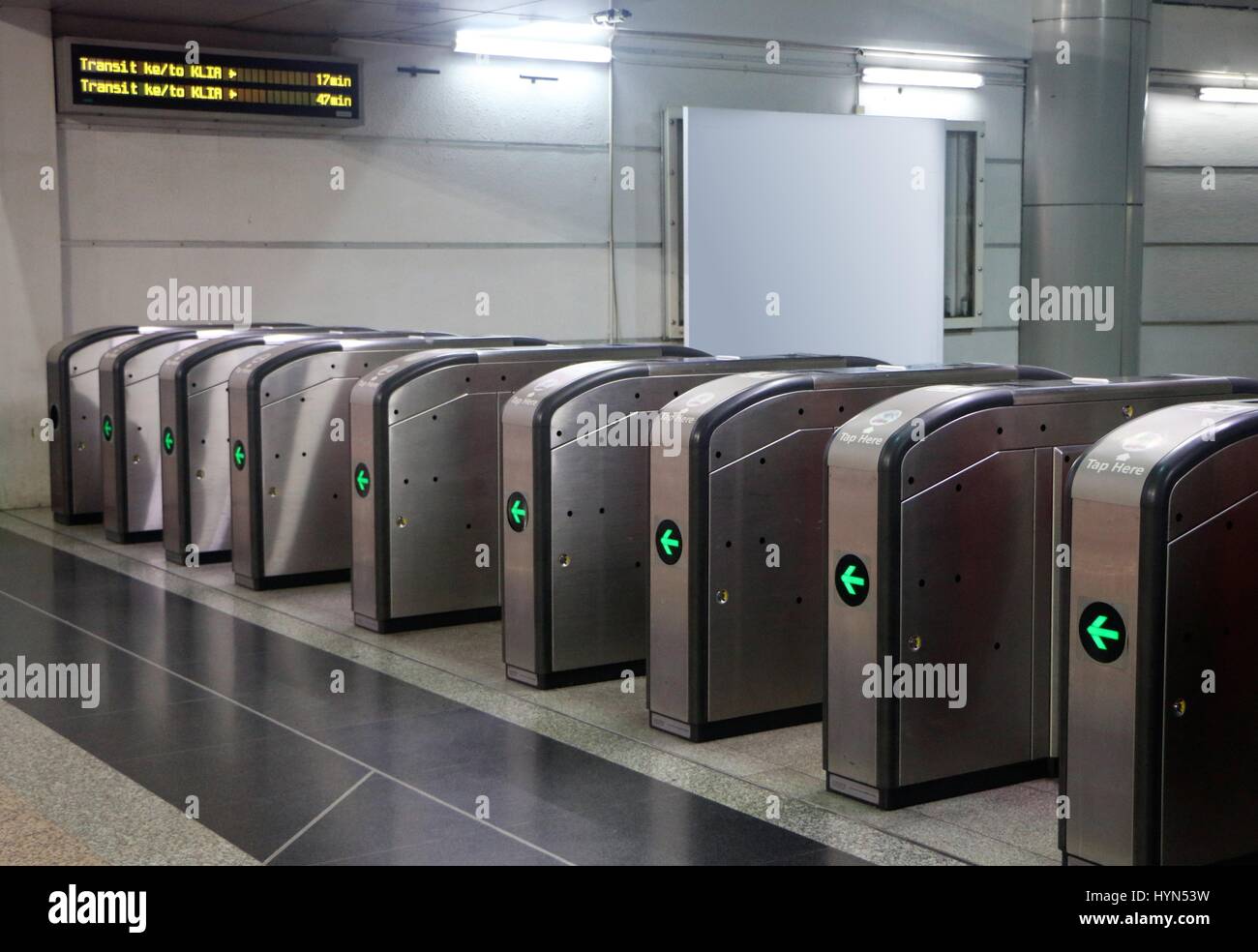 Entrance of railway station access gate Stock Photo - Alamy