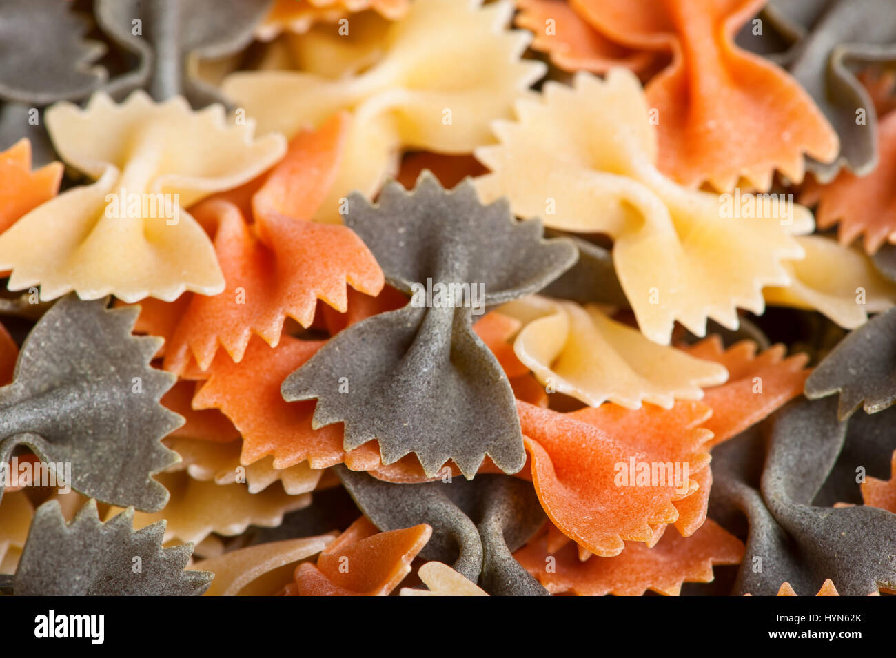 Colorful dry pasta background Stock Photo - Alamy