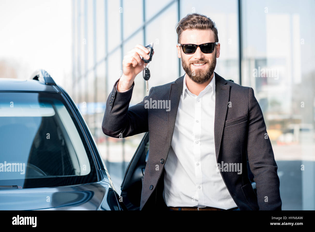 Man with keys near the car Stock Photo - Alamy