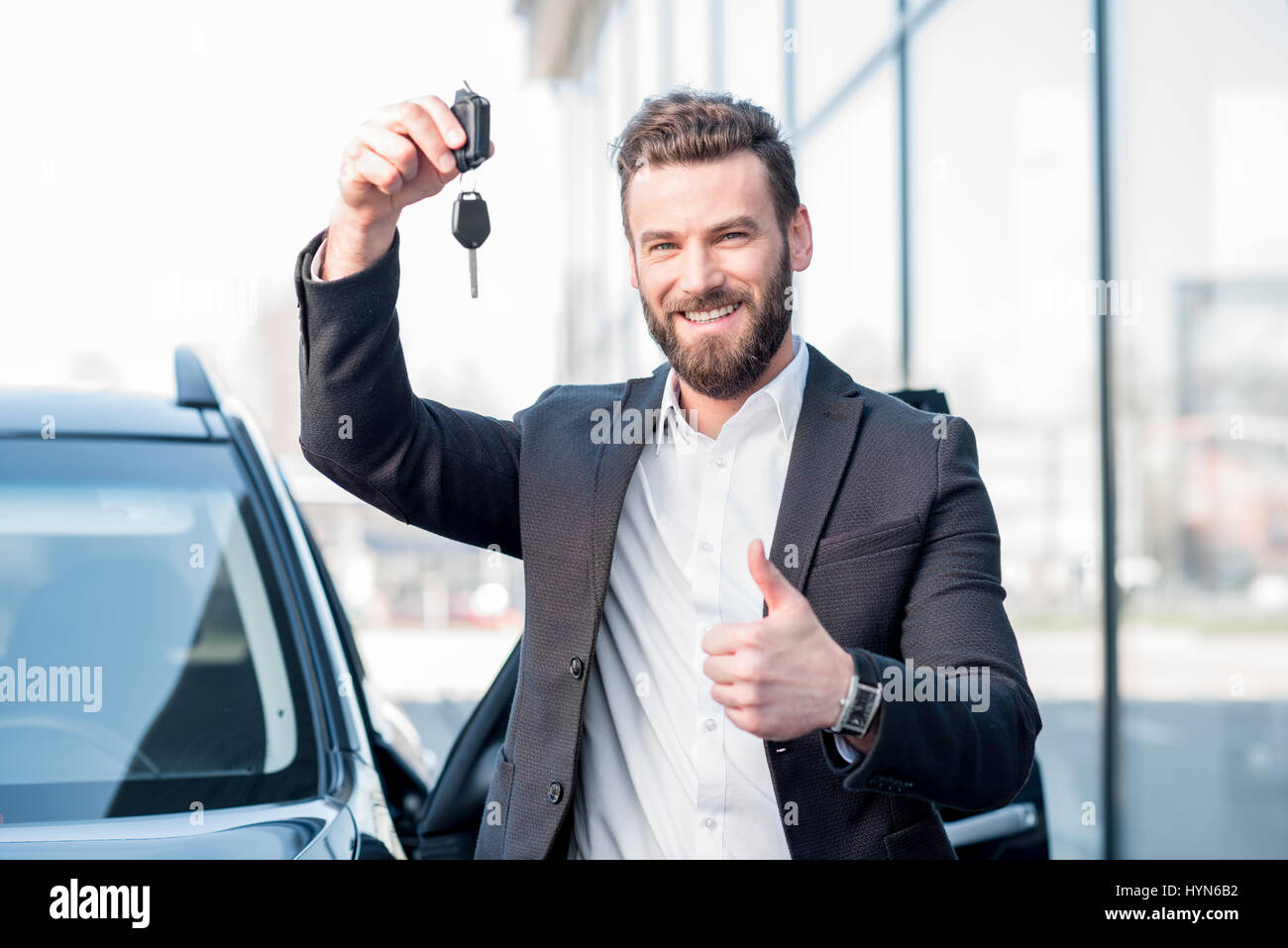 Man with keys near the car Stock Photo - Alamy
