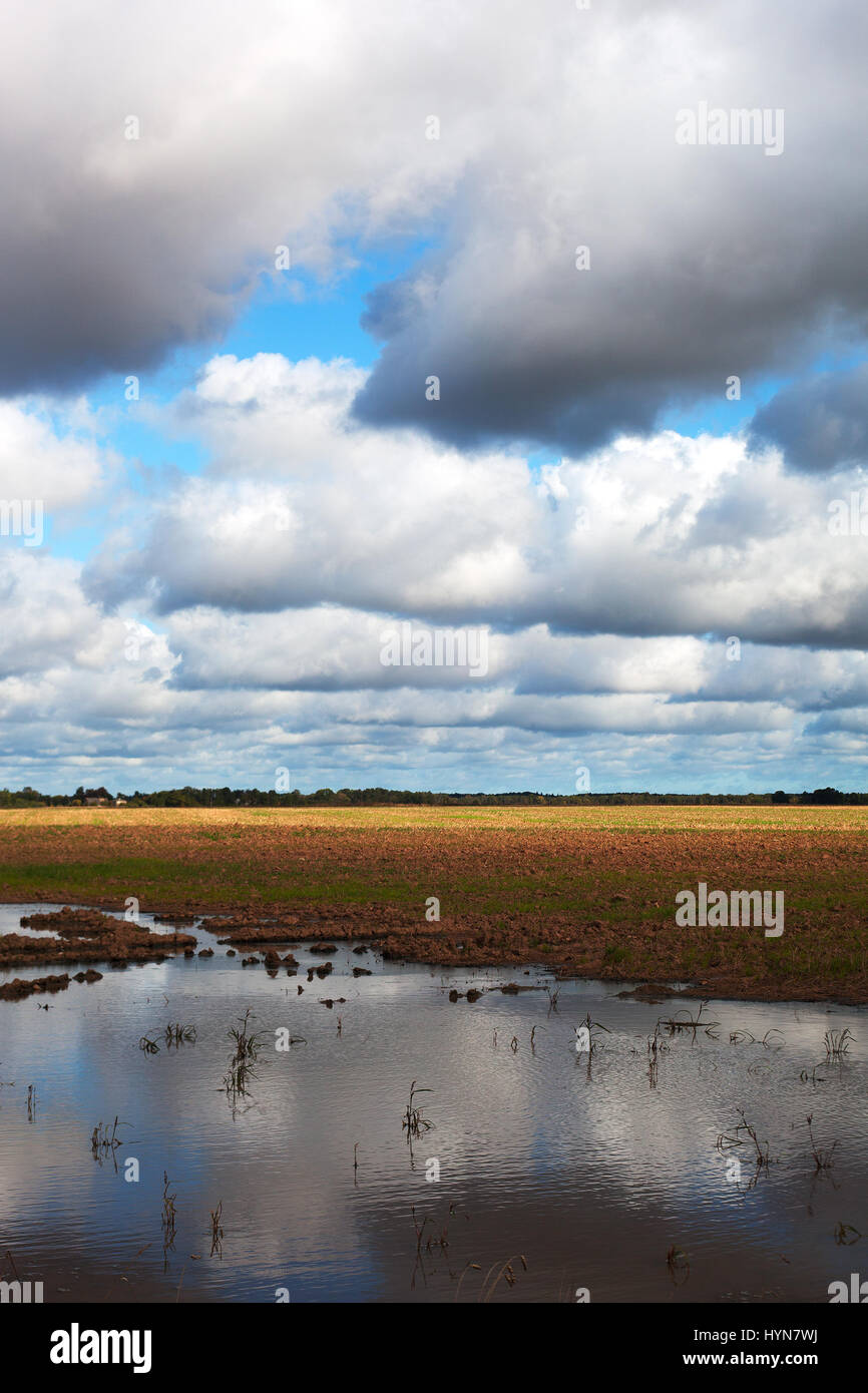 Cloudy sky over autumn fields Stock Photo - Alamy
