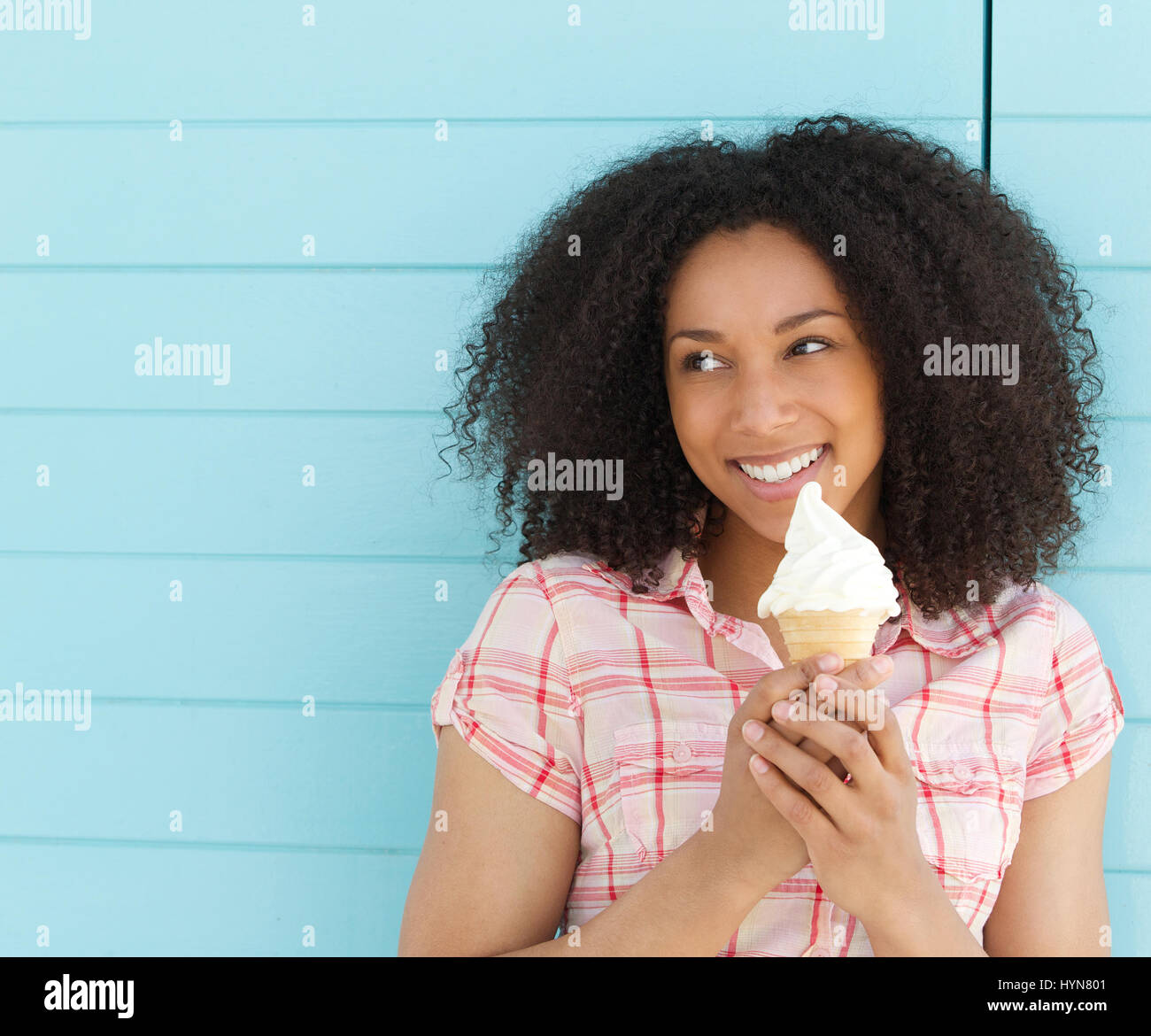 Close up of a girl eating an ice cream hi-res stock photography and ...